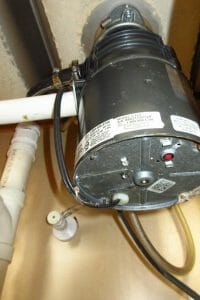 Garbage Disposal Jammed? (4 Common Causes & Steps To Fix Them)